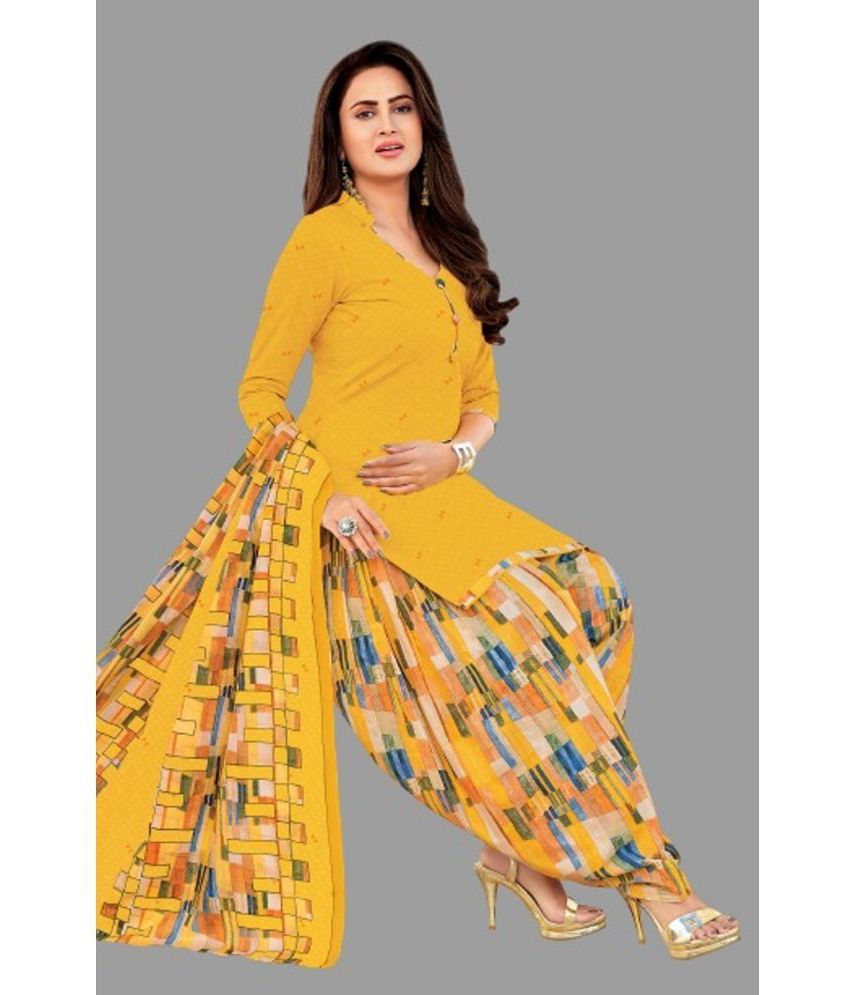 shree jeenmata collection - Unstitched Yellow Printed Dress Material ...